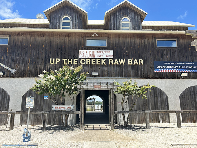 Up the Creek Raw Bar's weathered wooden exterior promises seafood so fresh it practically introduces itself before jumping onto your plate.