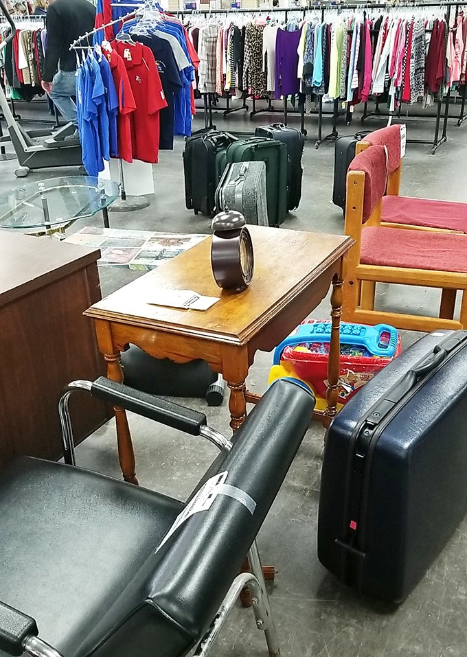 This furniture vignette tells stories of dinner parties past, while luggage waits for adventures yet to come.