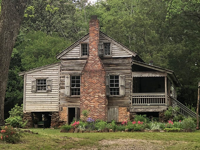 The William Harris Homestead stands as a rustic time capsule, its weathered clapboards and sturdy chimney whispering stories of generations past.