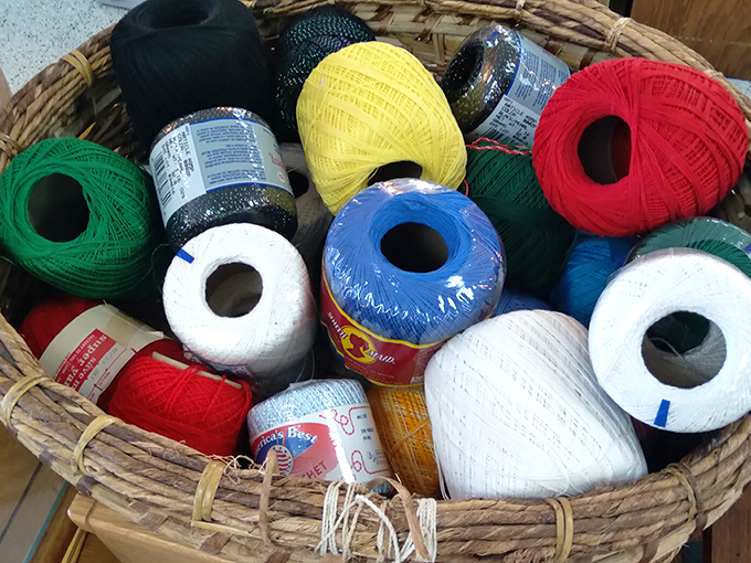 A crafter's color wheel of possibility! This basket of yarn holds enough potential scarves to keep an entire retirement community cozy through winter.