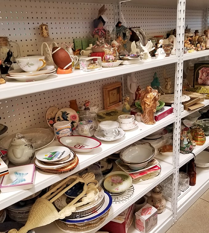 Grandma's china cabinet exploded onto these shelves&mdash;teacups, figurines, and nostalgic treasures waiting for their next chapter.