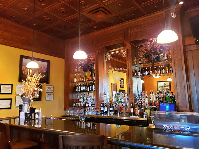 The bar area boasts an impressive selection of spirits beneath a stunning pressed-tin ceiling&mdash;liquid courage before tackling that 32-ounce steak.