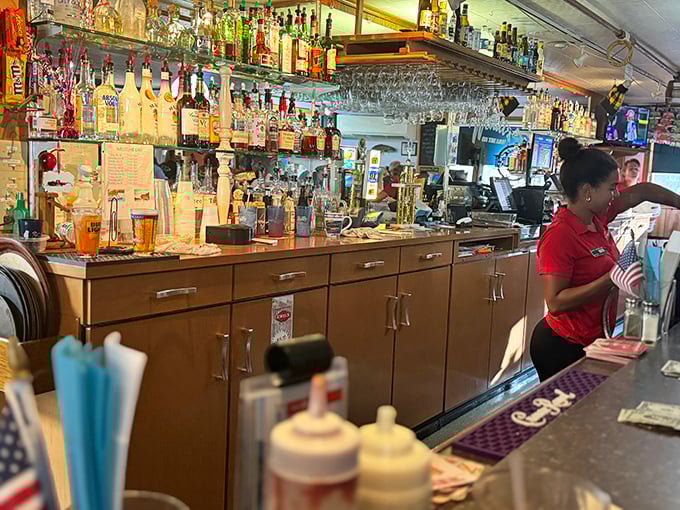A bar stocked like it's expecting a fish-induced apocalypse, where Old Fashioneds flow as freely as stories about "the one that got away."