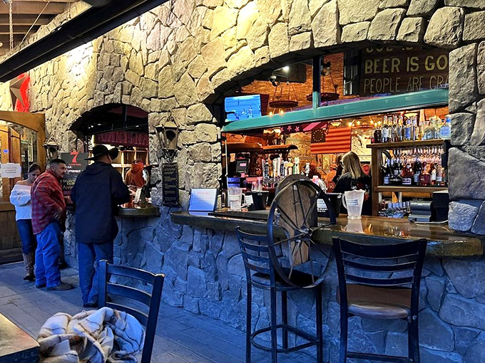 Beer is good, people are crazy&mdash;words to live by at this stone-crafted bar where cowboys and accountants stand shoulder to shoulder.
