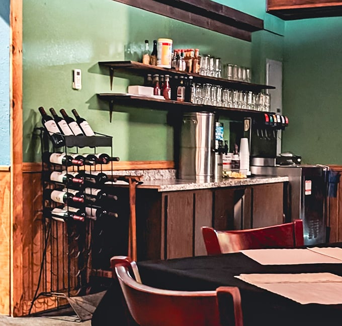 The beverage area strikes that perfect balance between well-stocked and approachable&mdash;where wine bottles stand ready without intimidating anyone into ordering "just water."