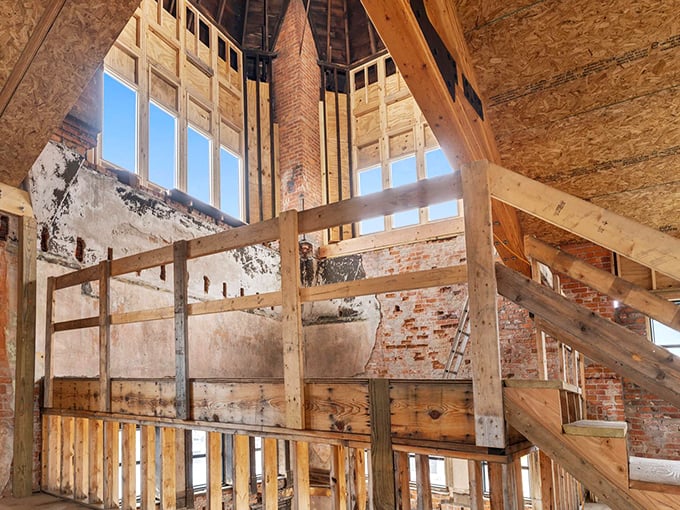 Inside, exposed brick and raw wooden beams tell stories of craftsmanship that modern construction just can't replicate anymore.