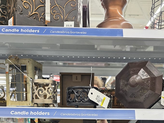 Candle holders ranging from "elegant dinner party" to "what exactly was the designer thinking?" All waiting for their second chance to shine.