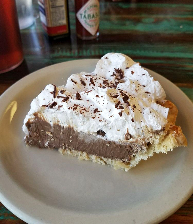 Chocolate cream pie with a mountain of whipped cream and chocolate shavings&mdash;proof that sometimes the best alien encounters in Roswell are on the dessert menu.