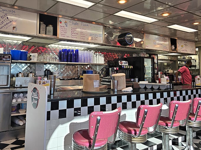 The counter isn't just seating—it's theater-in-the-round where short-order cooking becomes performance art and regulars are the appreciative audience.