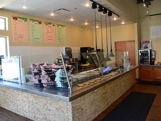 Where the magic begins &ndash; the counter showcases daily offerings behind glass. Like a jewelry store, but the gems are edible and infinitely more satisfying.