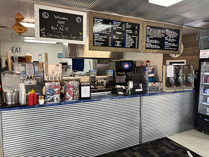 Behind the counter, where magic happens daily &ndash; note the chalkboard welcome sign that makes every visitor feel like a regular.
