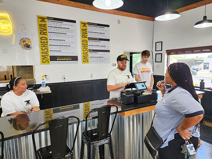The counter where burger dreams come true – like a modern-day Willy Wonka factory, but for adults who prefer beef to chocolate.