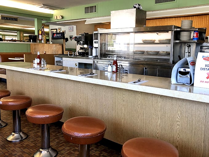 The counter where magic happens. Those stools have supported the weight of countless happy customers and their subsequent food comas.