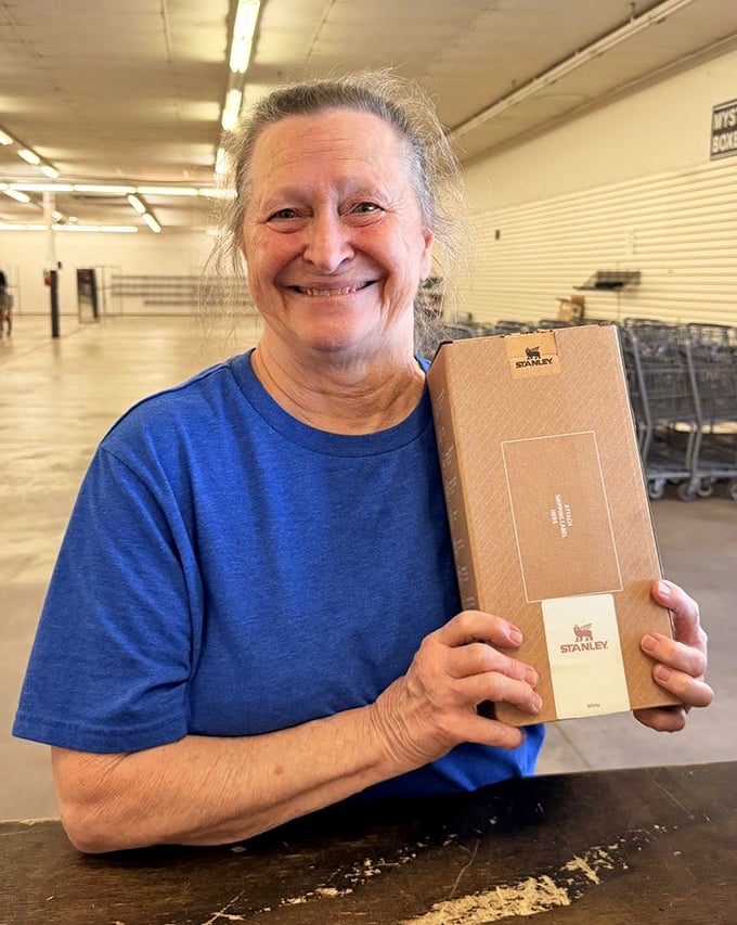 The face of victory! Nothing captures the thrill of the hunt like a shopper proudly displaying her Stanley find&mdash;retail therapy at its finest.