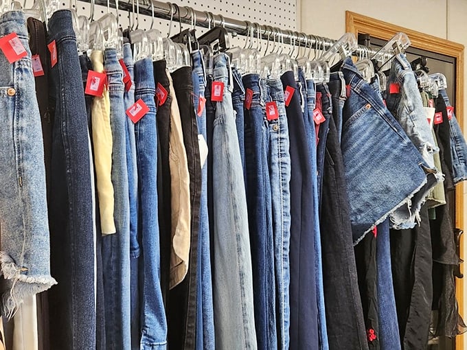 Denim dreams hanging in perfect formation. The holy grail of thrift finds&mdash;jeans that someone else already suffered through breaking in.