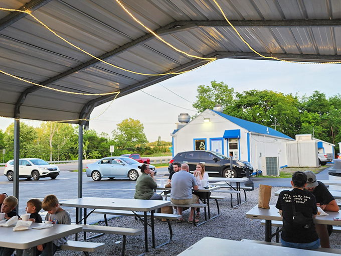 The universal language of good food brings everyone to the same tables. Notice the focused silence&mdash;that's the sound of serious eating happening.