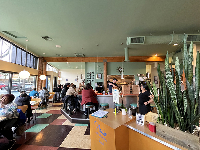 The bustling heart of Geraldine's—where plants thrive, conversations flow, and everyone's just one perfect bite away from breakfast bliss.