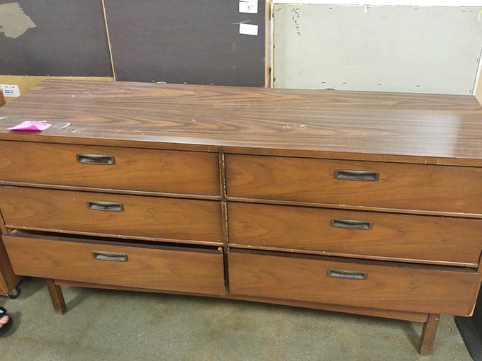 Mid-century modern meets practical storage needs. This wooden dresser has weathered decades of sock-stuffing and could easily handle decades more.