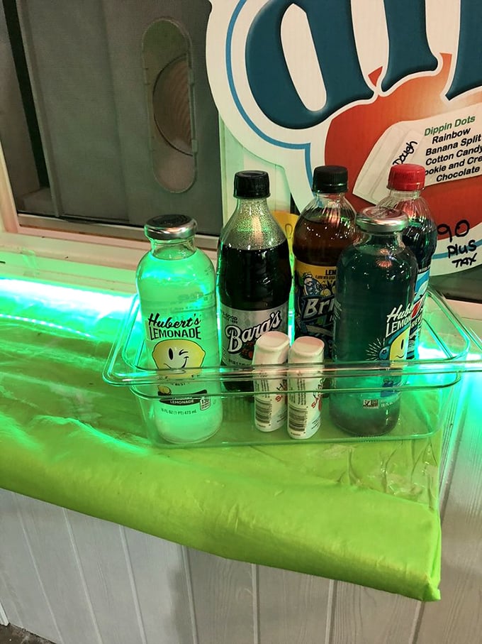 The drink selection glows with the same mysterious blue-green light that bigfoot hunters claim to see in nighttime forest footage.