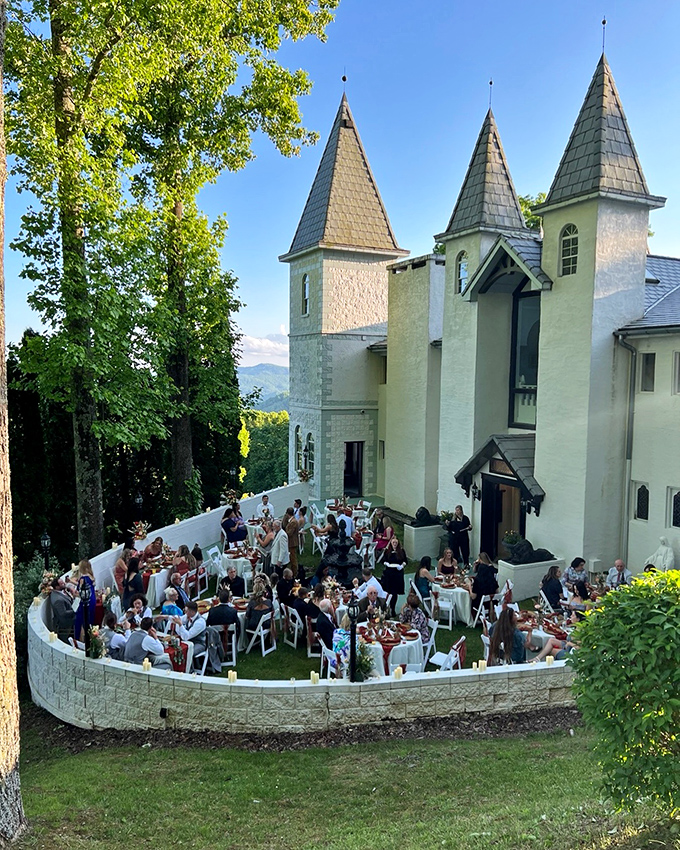 Dining al fresco with castle views? Yes, please! These lucky guests are experiencing what might be North Carolina's most impressive dinner party backdrop.