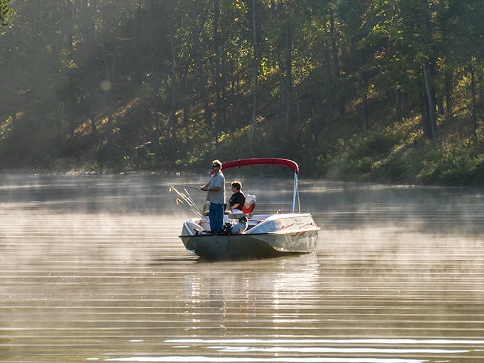 Dawn on the lake—when mist rises like spirits from the water and dedicated anglers find that perfect communion with silence.
