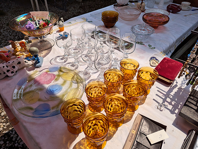 Amber glassware catches the sun like liquid honey frozen in time. Grandmother's missing tumbler might be hiding among these golden vessels of midcentury hospitality.