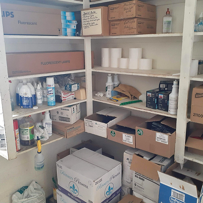 Behind the scenes, supplies stand ready. The unsung heroes of thrift store operations neatly arranged like a backstage Broadway production.