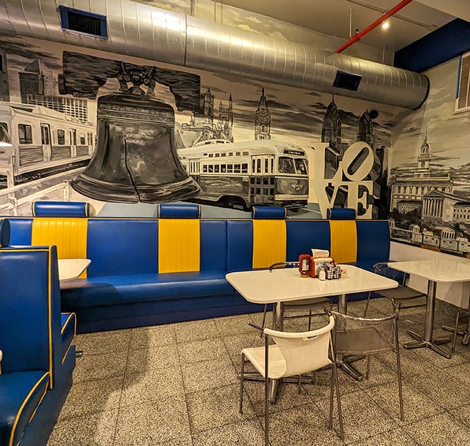 That Philadelphia mural isn't just decoration&mdash;it's a love letter to the city, complete with the Liberty Bell watching over your Liberty to order seconds.