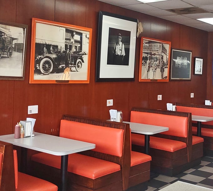 Historical photos line wood-paneled walls, silently telling stories of decades serving Norfolk's hungry masses.