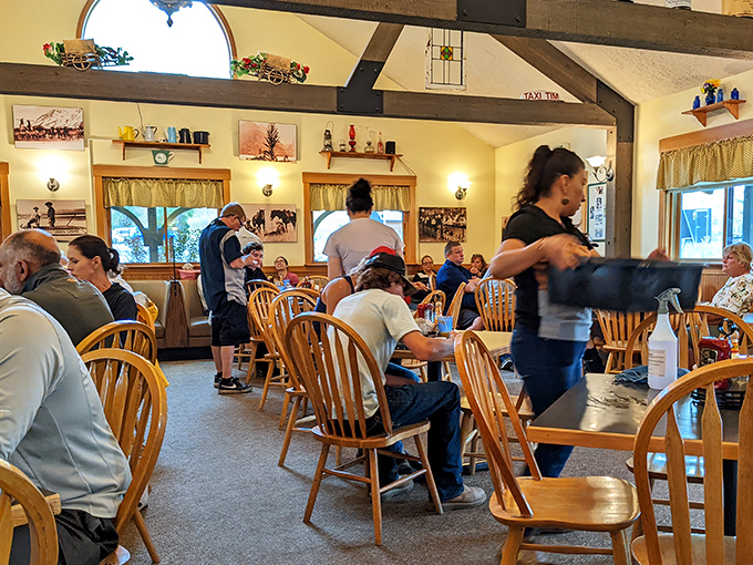 A dining room where the servers move with the choreographed precision of people who know exactly what you need before you do.