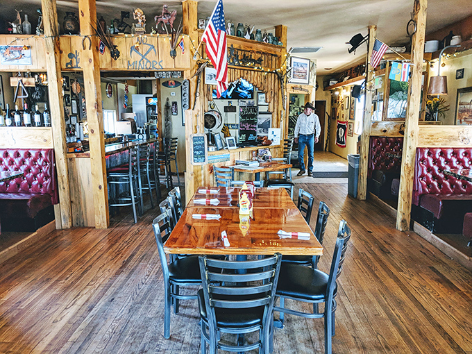 The dining room feels like the living room of that cool relative who collects interesting things and always has the best stories. Note the American flags&mdash;patriotism pairs well with everything here.