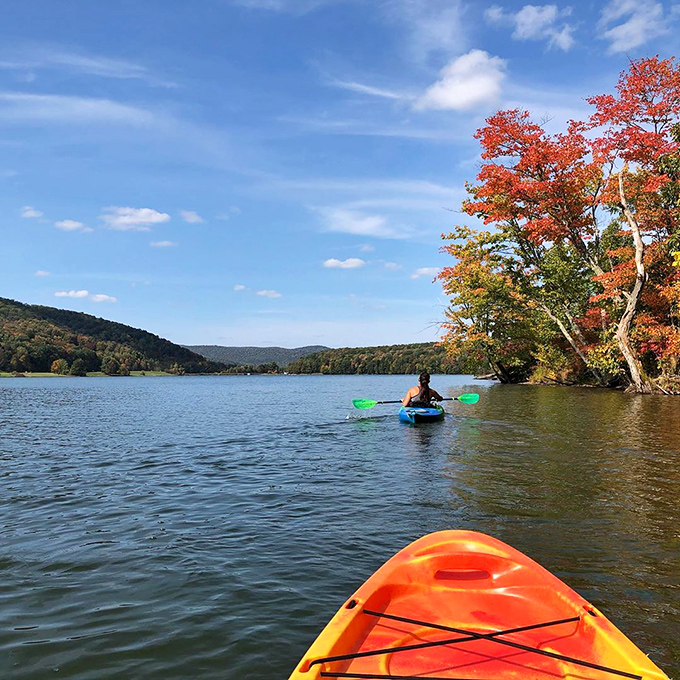 Paddle your worries away on crystal waters. Fall foliage creates the perfect backdrop for kayaking adventures that beat any therapy session.