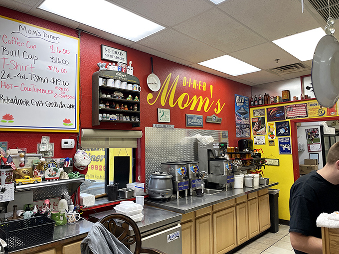 The kitchen pass&mdash;where comfort food dreams come true. Those hanging pans have seen more action than a Vegas casino floor.