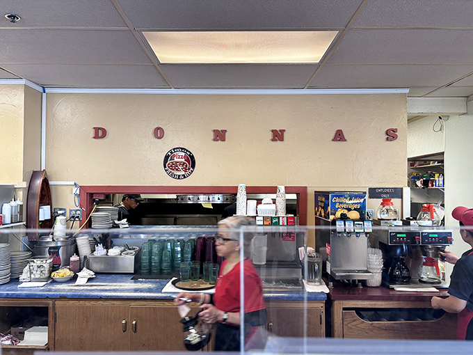 Behind the counter magic where breakfast dreams come true. The heart of Donna's beats with spatulas and sizzle.