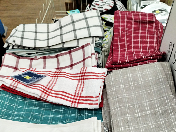 Kitchen towels arranged with the precision of a textile color wheel&mdash;each one ready to tackle spills with both efficiency and surprising style.