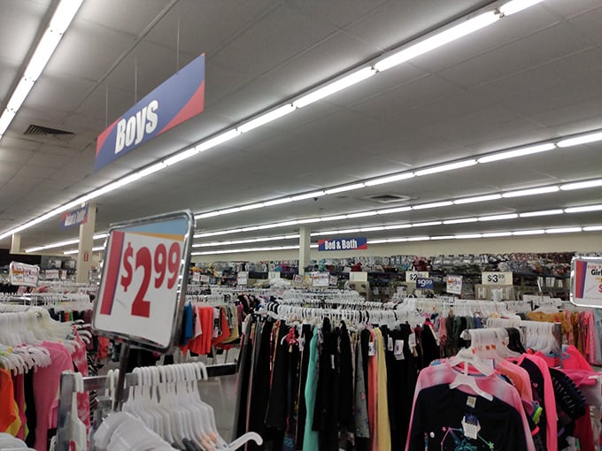 The "Boys" section reveals the store's connection to its sister brand, showcasing racks of affordable fashion beneath no-nonsense signage.