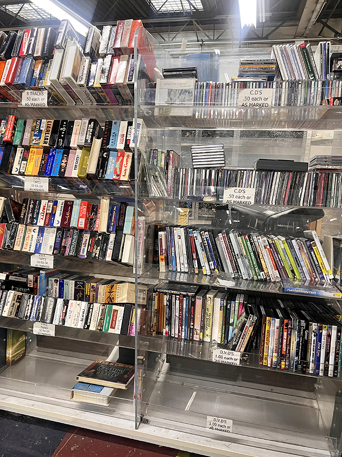 A media library that reminds us physical entertainment still exists. DVDs, CDs, and books waiting to be rediscovered in our streaming-obsessed world.