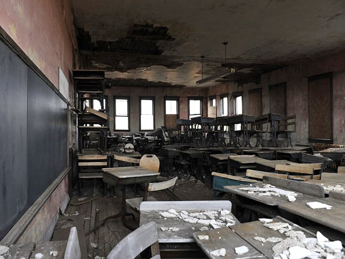 Desks await students who will never return, a haunting tableau of education frozen in time.