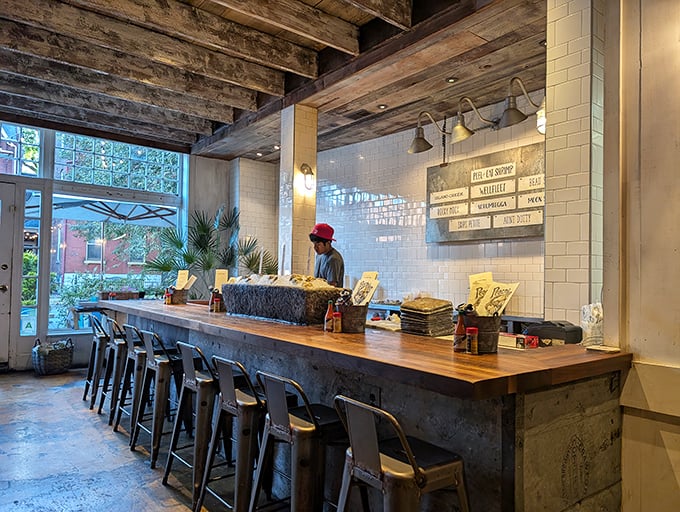 The seafood bar where oysters meet their destiny. Skilled hands transform ocean treasures into edible art while you watch.