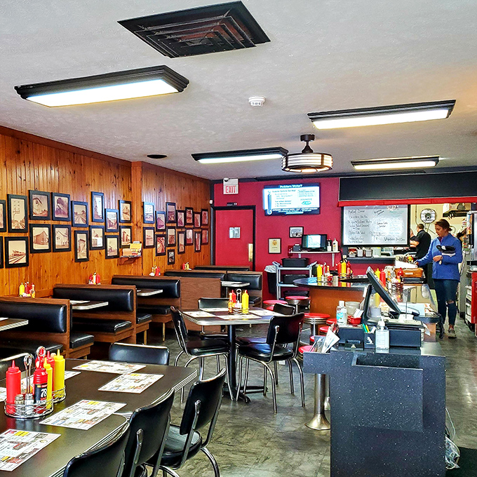 This no-frills diner interior sets the tone for comfort food classics, where friendly staff and familiar booths make every meal feel like home.