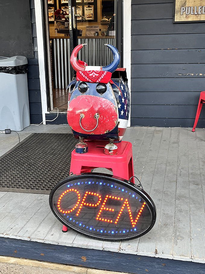 Nothing says "welcome to barbecue country" quite like a patriotic bull greeting you at the door with an illuminated invitation to indulge.