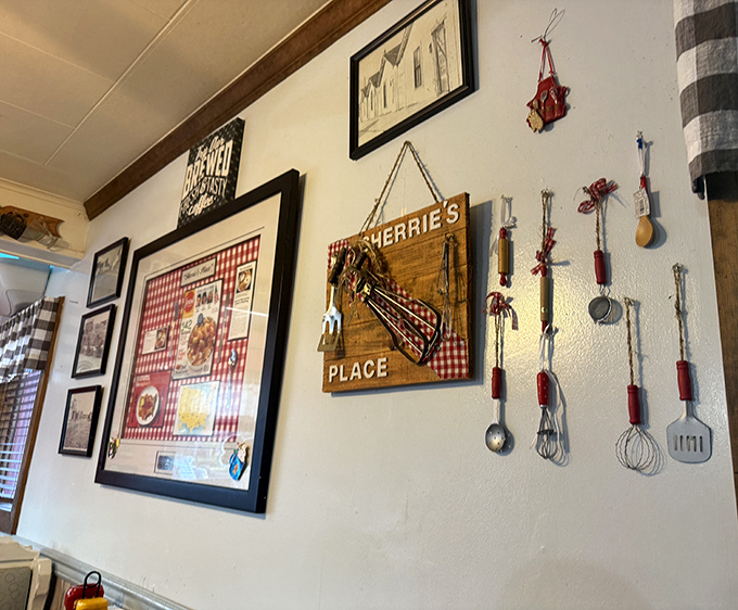 Wall d&eacute;cor featuring kitchen utensils and homey signs&mdash;the visual equivalent of a warm hug from your favorite aunt.