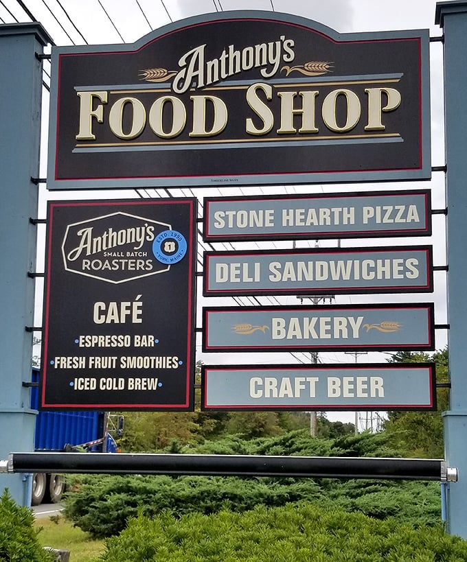 The sign tells the whole story: this isn't just a gas station, it's a food destination with multiple reasons to visit. Stone hearth pizza isn't just a description&mdash;it's a promise.