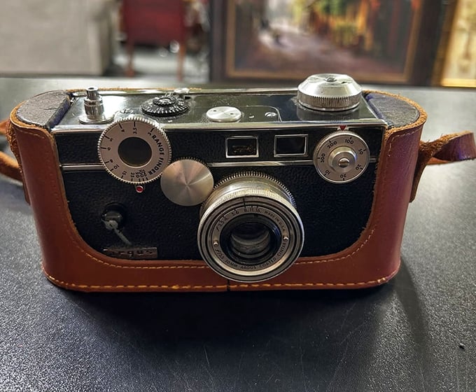 That vintage camera isn't just a decoration—it's a time machine. Imagine the moments it's captured, the memories preserved in its mechanical heart.