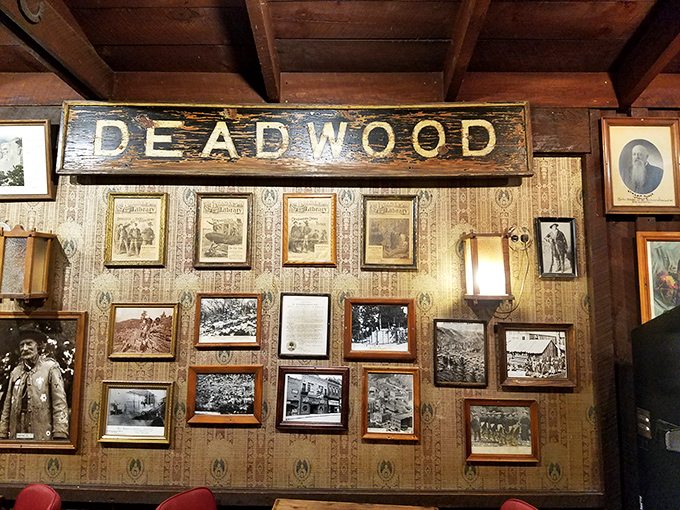 A wall of Deadwood history watches over diners, reminding you that you're eating in a town where legends once walked—and apparently got hungry too.