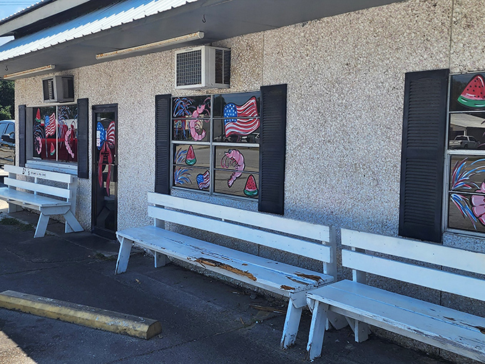 Those colorful painted windows hint at the seafood carnival waiting inside this roadside gem.