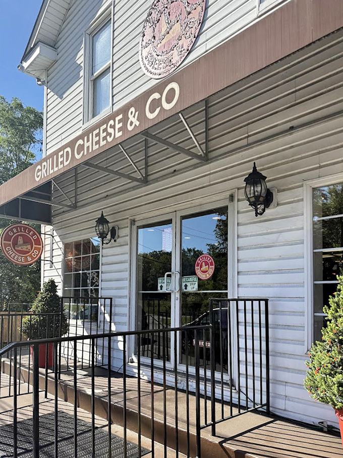 Grilled Cheese & Co.'s charming white house looks like it was plucked from a storybook where the happy ending always involves melted cheese.