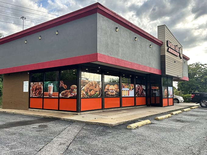 Orange and gray color scheme screams modern confidence - this place knows exactly what it's doing.