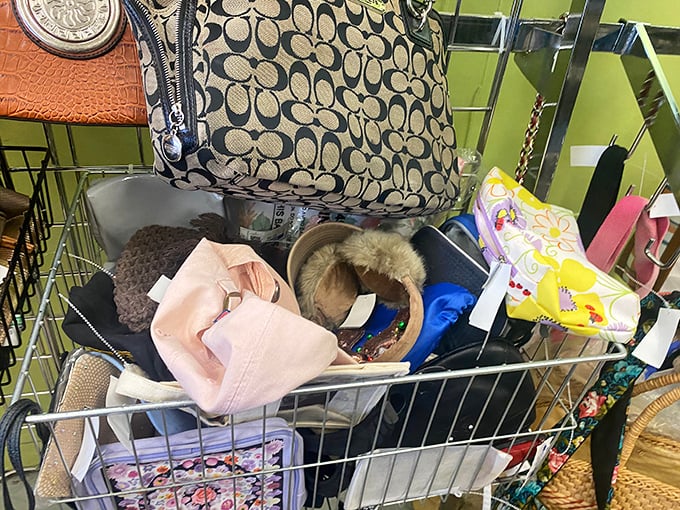 A Coach bag peeks out from a bin of accessories &ndash; the thrill of the hunt is real.