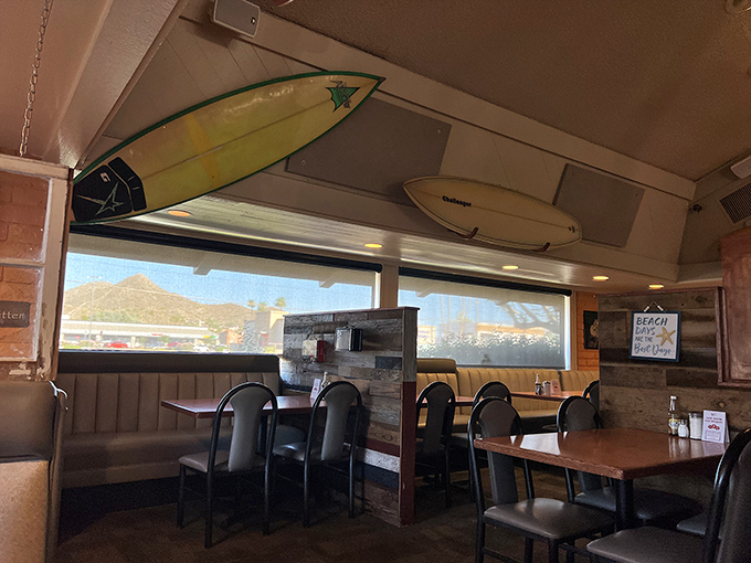 Surfboards mounted above cozy booths create the feeling you've stumbled into a secret breakfast club where the password is "extra syrup, please."